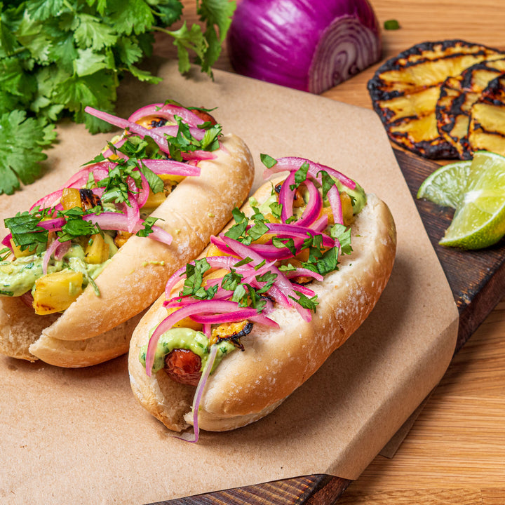 The Grilled Pineapple & Avocado Lime Crema Dog – Miller's Craft Meats
